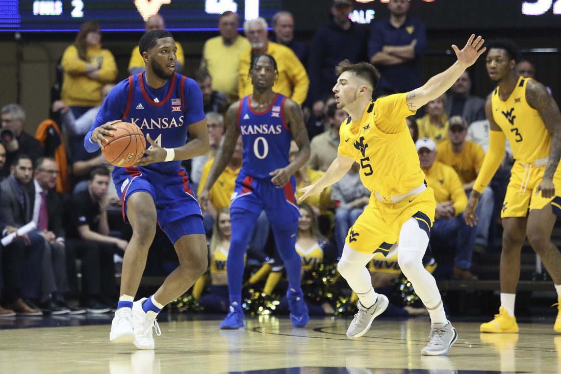 Senior shooter Isaiah Moss adds emotion to game to help Kansas upend ...